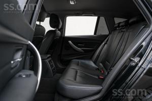 Black BMW 330 2013 in Riga, with an engine capacity of 3.00 L and mileage of 377 thousand km for 9250 €, photo 12 on AUTOMOTO.COM.LV