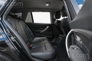 Black BMW 330 2013 in Riga, with an engine capacity of 3.00 L and mileage of 377 thousand km for 9250 €, photo 13 on AUTOMOTO.COM.LV