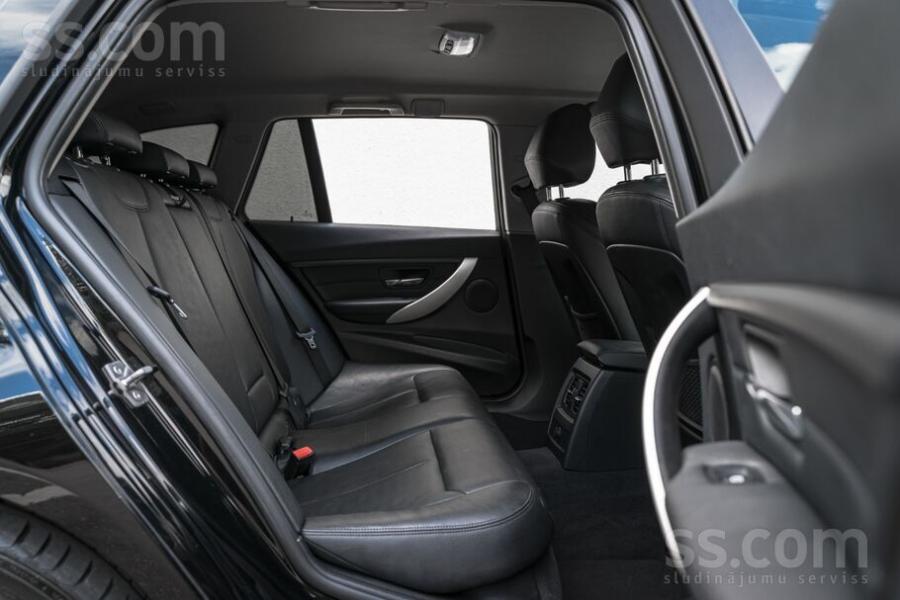 Black BMW 330 2013 in Riga, with an engine capacity of 3.00 L and mileage of 377 thousand km for 9250 €, photo 13 on AUTOMOTO.COM.LV