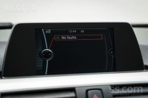 Black BMW 330 2013 in Riga, with an engine capacity of 3.00 L and mileage of 377 thousand km for 9250 €, photo 25 on AUTOMOTO.COM.LV