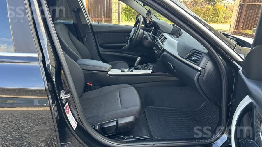 Black BMW 330 2014 in Rezekne, with an engine capacity of 3.00 L and mileage of 220 thousand km for 9750 €, photo 12 on AUTOMOTO.COM.LV