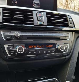 Black BMW 330 2014 in Kretinga, with an engine capacity of 2.99 L and mileage of 303 thousand km for 11999 €, photo 26 on AUTOMOTO.COM.LV