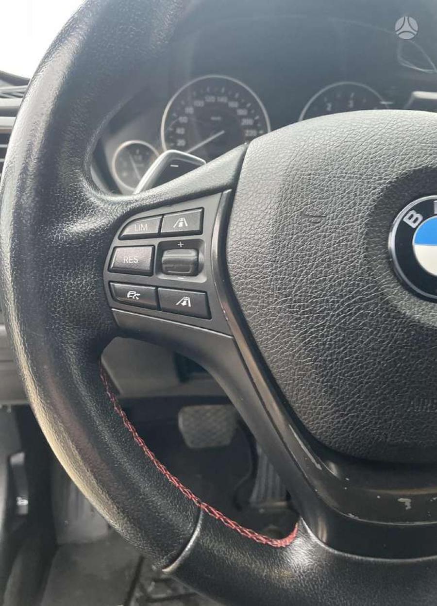 Black BMW 330 2014 in Vilnius, with an engine capacity of 2.99 L and mileage of 245 thousand km for 8990 €, photo 18 on AUTOMOTO.COM.LV