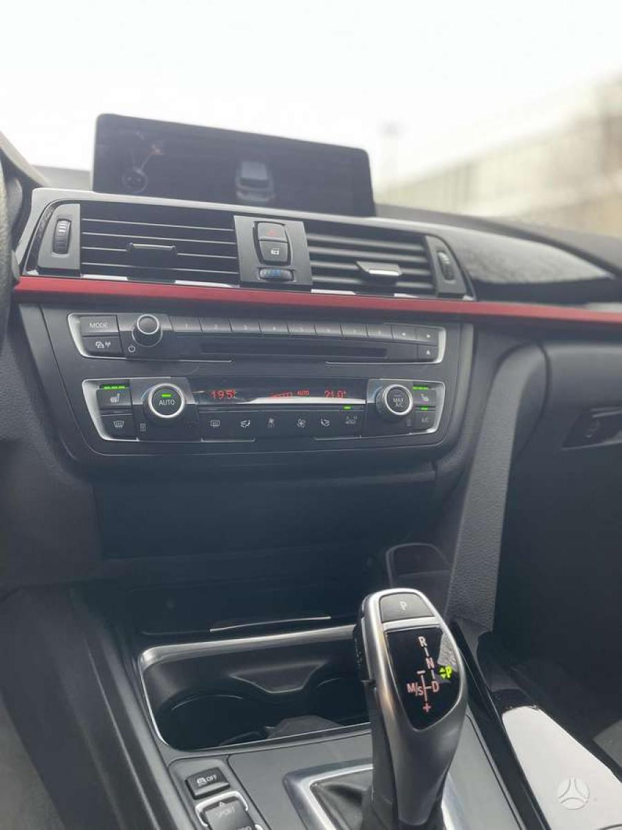 Black BMW 330 2014 in Vilnius, with an engine capacity of 2.99 L and mileage of 245 thousand km for 8990 €, photo 21 on AUTOMOTO.COM.LV