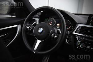 Black BMW 330 2019 in Tukums, with an engine capacity of 2.00 L and mileage of 217 thousand km for 17990 €, photo 13 on AUTOMOTO.COM.LV