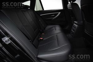Black BMW 330 2019 in Tukums, with an engine capacity of 2.00 L and mileage of 217 thousand km for 17990 €, photo 23 on AUTOMOTO.COM.LV