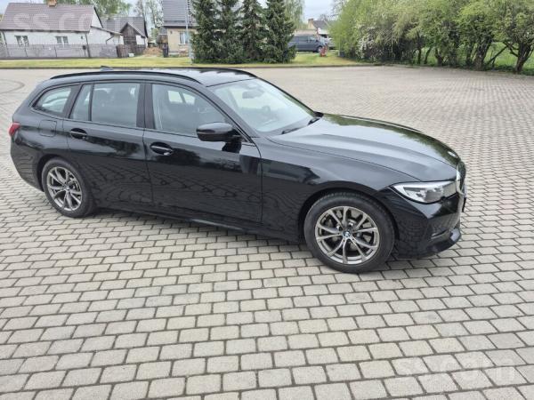 Black BMW 330 2020 in Dobele, with an engine capacity of 3.00 L and mileage of 146 thousand km for 22450 €, photo 6 on AUTOMOTO.COM.LV