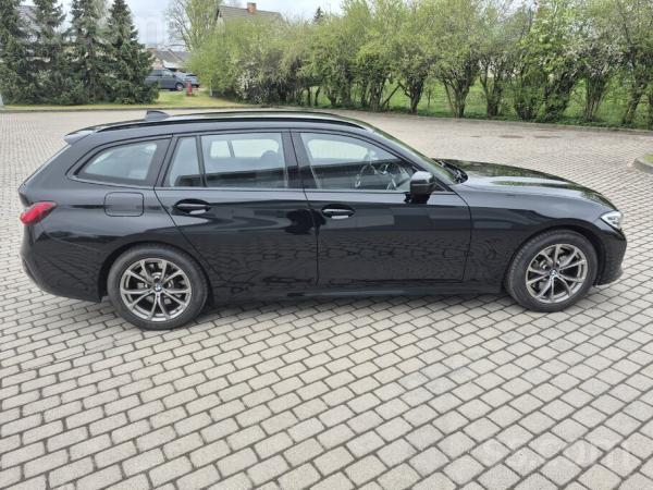 Black BMW 330 2020 in Dobele, with an engine capacity of 3.00 L and mileage of 146 thousand km for 22450 €, photo 7 on AUTOMOTO.COM.LV