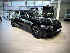 Black BMW 330 2021 in Dobele, with an engine capacity of 2.00 L and mileage of 230 thousand km for 20950 €, photo  on AUTOMOTO.COM.LV