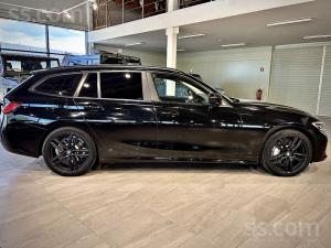 Black BMW 330 2021 in Dobele, with an engine capacity of 2.00 L and mileage of 230 thousand km for 20950 €, photo 3 on AUTOMOTO.COM.LV