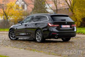 Black BMW 330 2021 in Jelgava, with an engine capacity of 2.00 L and mileage of 205 thousand km for 20900 €, photo 5 on AUTOMOTO.COM.LV
