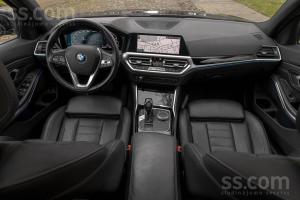 Black BMW 330 2021 in Jelgava, with an engine capacity of 2.00 L and mileage of 205 thousand km for 20900 €, photo 8 on AUTOMOTO.COM.LV