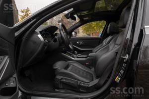 Black BMW 330 2021 in Jelgava, with an engine capacity of 2.00 L and mileage of 205 thousand km for 20900 €, photo 11 on AUTOMOTO.COM.LV
