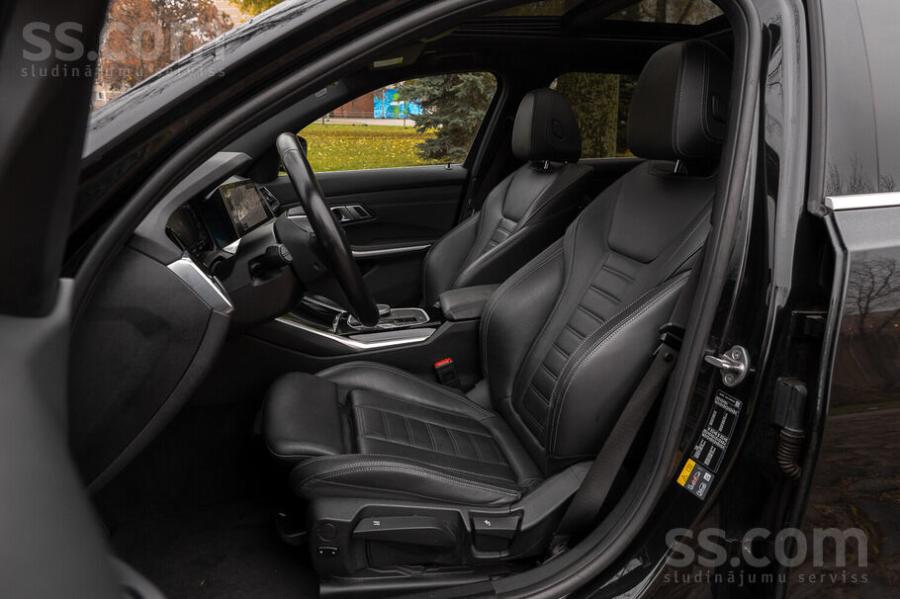 Black BMW 330 2021 in Jelgava, with an engine capacity of 2.00 L and mileage of 205 thousand km for 20900 €, photo 12 on AUTOMOTO.COM.LV