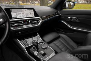 Black BMW 330 2021 in Jelgava, with an engine capacity of 2.00 L and mileage of 205 thousand km for 20900 €, photo 14 on AUTOMOTO.COM.LV