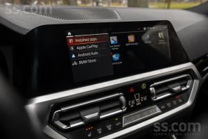 Black BMW 330 2021 in Jelgava, with an engine capacity of 2.00 L and mileage of 205 thousand km for 20900 €, photo 20 on AUTOMOTO.COM.LV