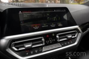 Black BMW 330 2021 in Jelgava, with an engine capacity of 2.00 L and mileage of 205 thousand km for 20900 €, photo 23 on AUTOMOTO.COM.LV