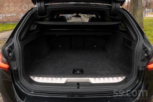 Black BMW 330 2021 in Jelgava, with an engine capacity of 2.00 L and mileage of 205 thousand km for 20900 €, photo 27 on AUTOMOTO.COM.LV