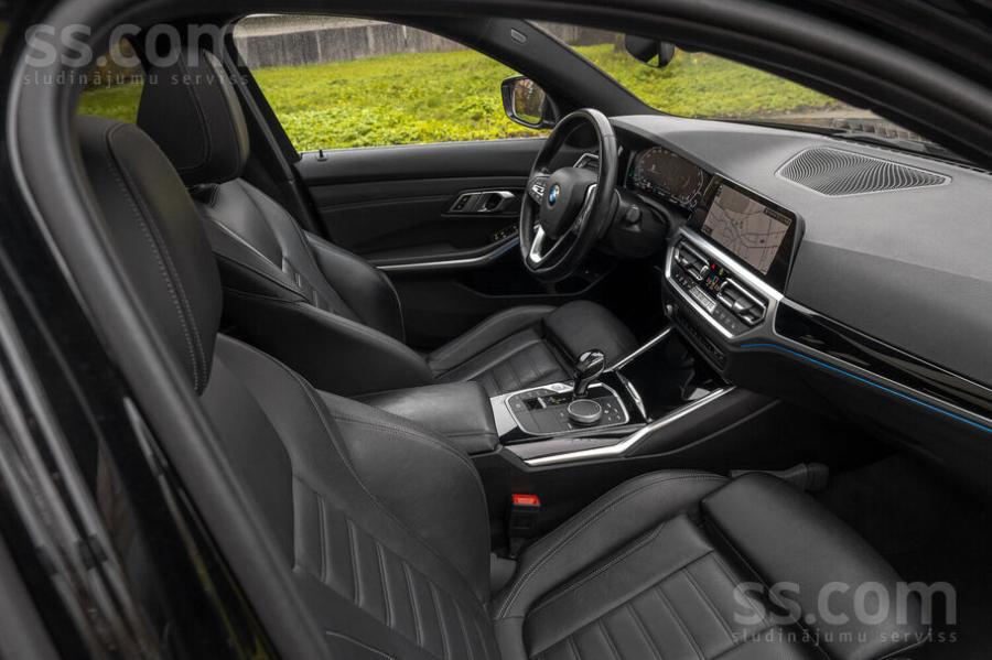 Black BMW 330 2021 in Jelgava, with an engine capacity of 2.00 L and mileage of 205 thousand km for 20900 €, photo 28 on AUTOMOTO.COM.LV