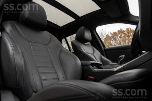 Black BMW 330 2021 in Jelgava, with an engine capacity of 2.00 L and mileage of 205 thousand km for 20900 €, photo 29 on AUTOMOTO.COM.LV