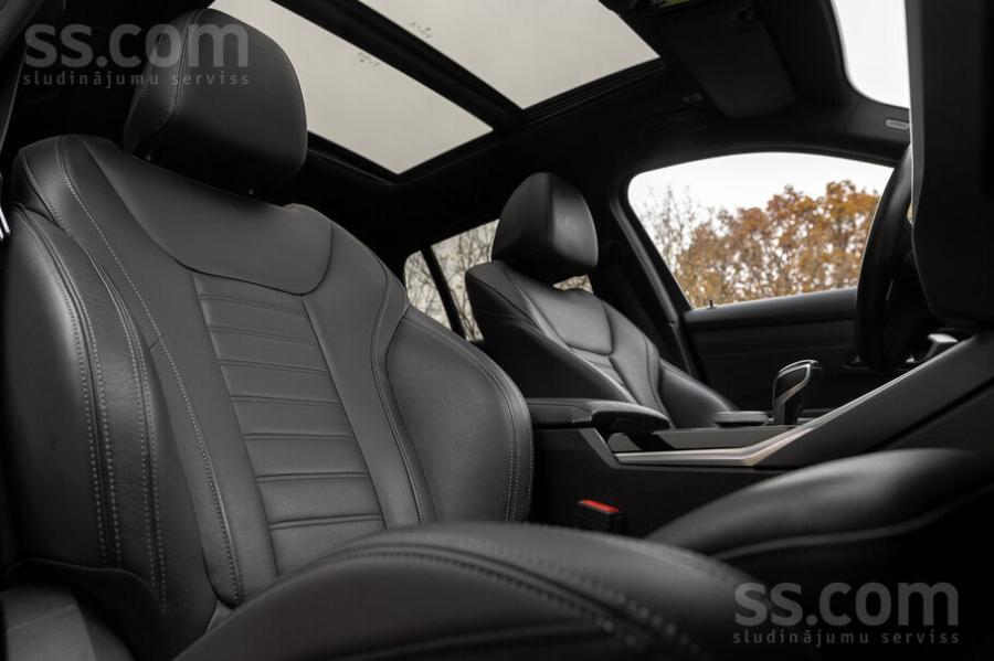 Black BMW 330 2021 in Jelgava, with an engine capacity of 2.00 L and mileage of 205 thousand km for 20900 €, photo 29 on AUTOMOTO.COM.LV