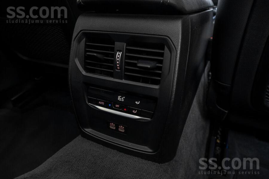 Black BMW 330 2021 in Jelgava, with an engine capacity of 2.00 L and mileage of 205 thousand km for 20900 €, photo 31 on AUTOMOTO.COM.LV