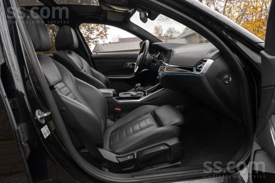 Black BMW 330 2021 in Jelgava, with an engine capacity of 2.00 L and mileage of 205 thousand km for 20900 €, photo 32 on AUTOMOTO.COM.LV