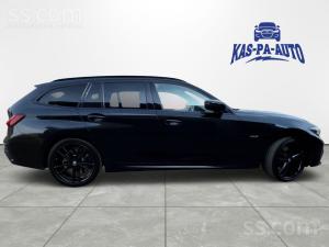 Black BMW 330 2021 in Riga, with an engine capacity of 2.00 L and mileage of 176 thousand km for 23999 €, photo 5 on AUTOMOTO.COM.LV