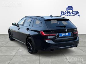 Black BMW 330 2021 in Riga, with an engine capacity of 2.00 L and mileage of 176 thousand km for 23999 €, photo 8 on AUTOMOTO.COM.LV