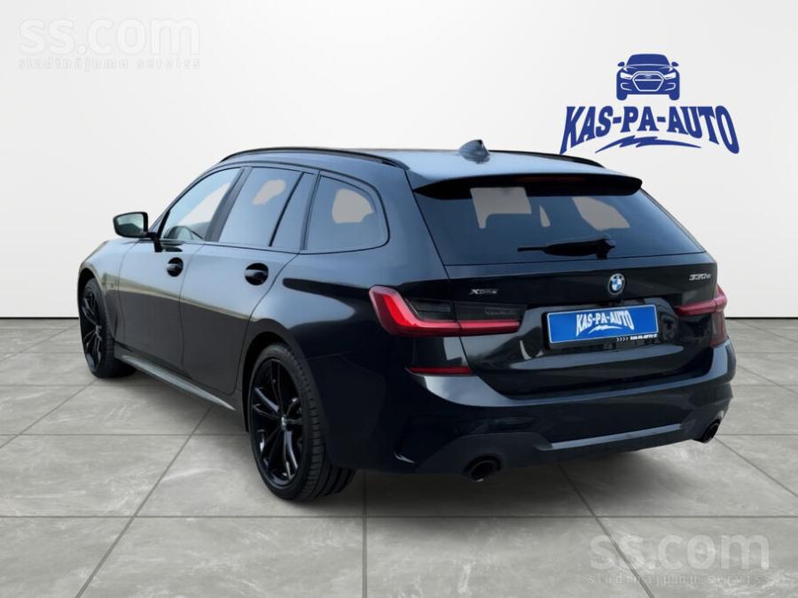 Black BMW 330 2021 in Riga, with an engine capacity of 2.00 L and mileage of 176 thousand km for 23999 €, photo 8 on AUTOMOTO.COM.LV