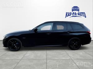 Black BMW 330 2021 in Riga, with an engine capacity of 2.00 L and mileage of 176 thousand km for 23999 €, photo 9 on AUTOMOTO.COM.LV