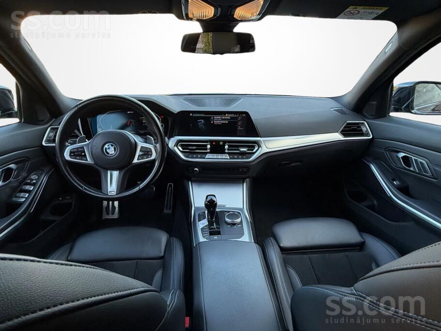 Black BMW 330 2021 in Riga, with an engine capacity of 2.00 L and mileage of 176 thousand km for 23999 €, photo 10 on AUTOMOTO.COM.LV