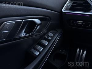 Black BMW 330 2021 in Riga, with an engine capacity of 2.00 L and mileage of 176 thousand km for 23999 €, photo 15 on AUTOMOTO.COM.LV