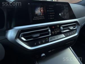 Black BMW 330 2021 in Riga, with an engine capacity of 2.00 L and mileage of 176 thousand km for 23999 €, photo 16 on AUTOMOTO.COM.LV