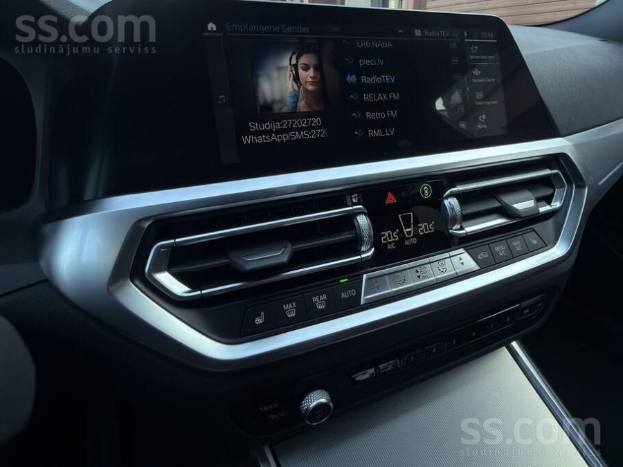 Black BMW 330 2021 in Riga, with an engine capacity of 2.00 L and mileage of 176 thousand km for 23999 €, photo 16 on AUTOMOTO.COM.LV