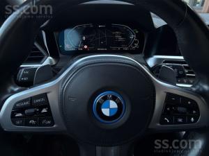Black BMW 330 2021 in Riga, with an engine capacity of 2.00 L and mileage of 176 thousand km for 23999 €, photo 17 on AUTOMOTO.COM.LV