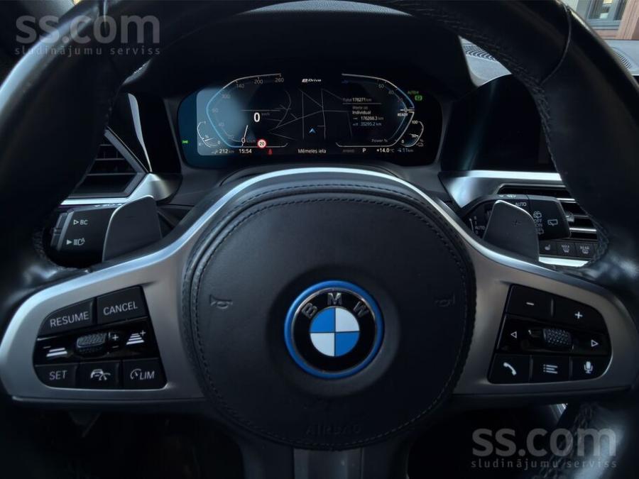 Black BMW 330 2021 in Riga, with an engine capacity of 2.00 L and mileage of 176 thousand km for 23999 €, photo 17 on AUTOMOTO.COM.LV