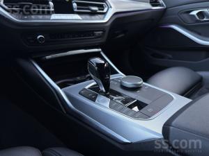 Black BMW 330 2021 in Riga, with an engine capacity of 2.00 L and mileage of 176 thousand km for 23999 €, photo 18 on AUTOMOTO.COM.LV