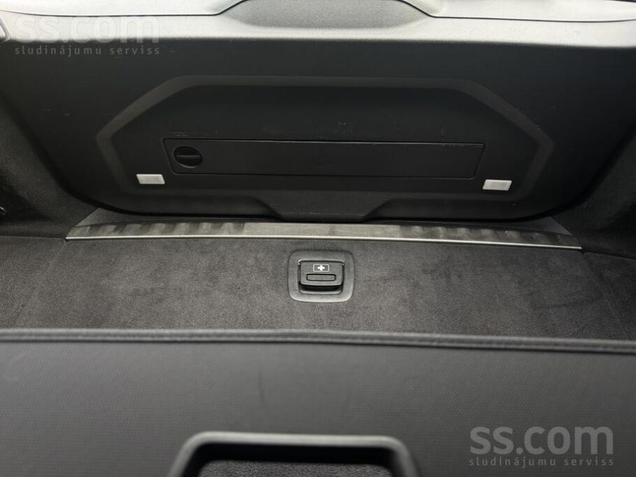 Black BMW 330 2021 in Riga, with an engine capacity of 2.00 L and mileage of 176 thousand km for 23999 €, photo 21 on AUTOMOTO.COM.LV