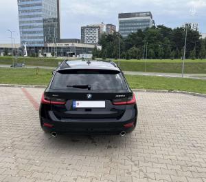 Black BMW 330 2021 in Vilnius, with an engine capacity of 2.00 L and mileage of 141 thousand km for 21900 €, photo 6 on AUTOMOTO.COM.LV