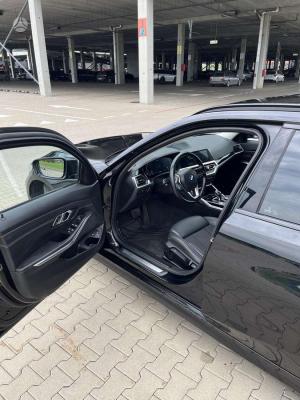 Black BMW 330 2021 in Vilnius, with an engine capacity of 2.00 L and mileage of 141 thousand km for 21900 €, photo 11 on AUTOMOTO.COM.LV