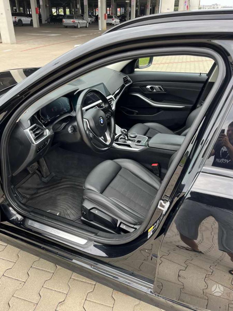 Black BMW 330 2021 in Vilnius, with an engine capacity of 2.00 L and mileage of 141 thousand km for 21900 €, photo 12 on AUTOMOTO.COM.LV