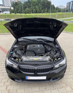 Black BMW 330 2021 in Vilnius, with an engine capacity of 2.00 L and mileage of 141 thousand km for 21900 €, photo 22 on AUTOMOTO.COM.LV