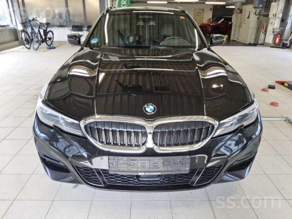 Black BMW 330 2021 in Riga, with an engine capacity of 3.00 L and mileage of 194 thousand km for 24700 €, photo 5 on AUTOMOTO.COM.LV