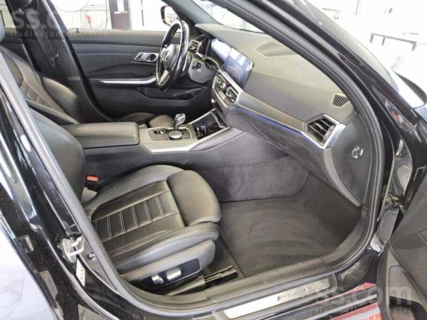 Black BMW 330 2021 in Riga, with an engine capacity of 3.00 L and mileage of 194 thousand km for 24700 €, photo 6 on AUTOMOTO.COM.LV