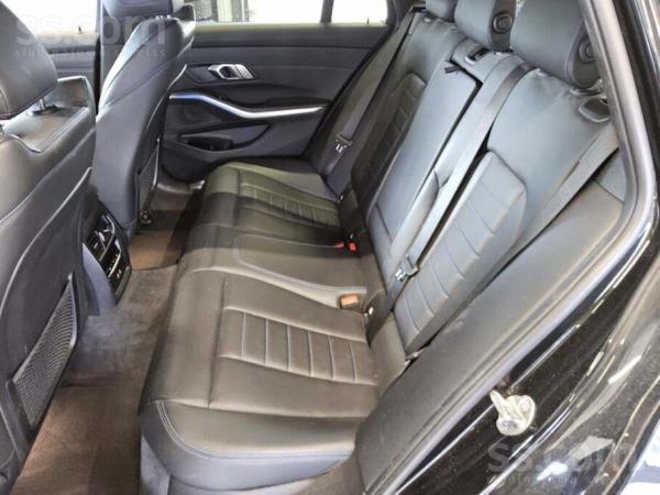 Black BMW 330 2021 in Riga, with an engine capacity of 3.00 L and mileage of 194 thousand km for 24700 €, photo 7 on AUTOMOTO.COM.LV