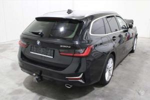 Black BMW 330 2021 in Gargzdai, with an engine capacity of 2.00 L and mileage of 149 thousand km for 9500 €, photo  on AUTOMOTO.COM.LV