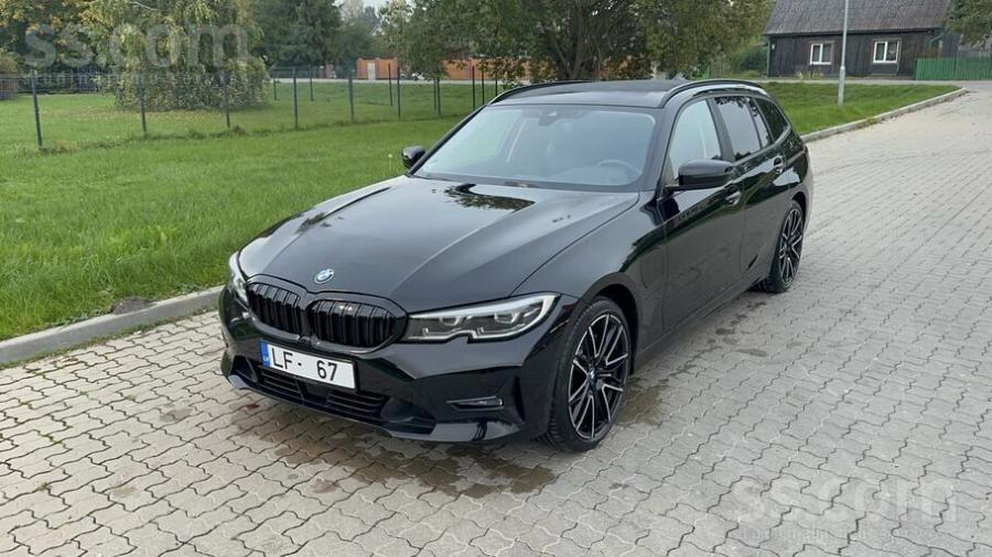 Black BMW 330 2021 in Dobele, with an engine capacity of 2.00 L and mileage of 209 thousand km for 20595 €, photo 4 on AUTOMOTO.COM.LV