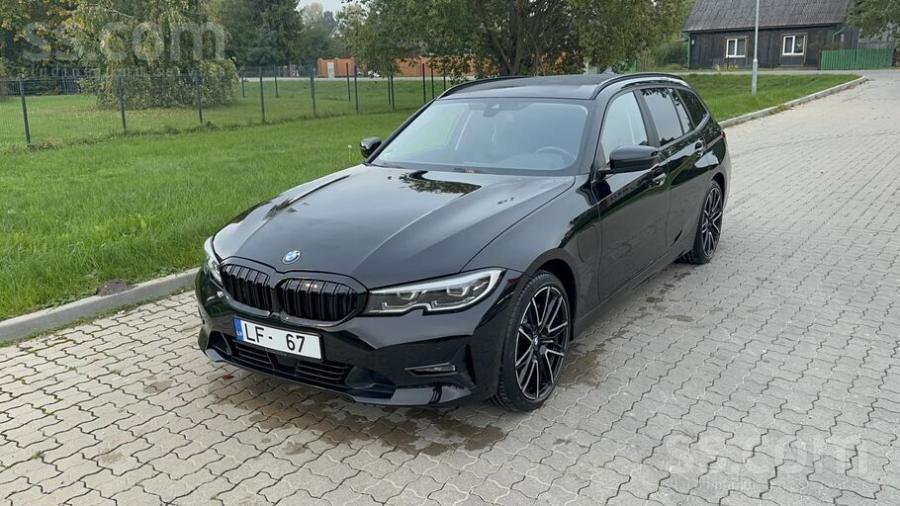 Black BMW 330 2021 in Dobele, with an engine capacity of 2.00 L and mileage of 209 thousand km for 20595 €, photo 5 on AUTOMOTO.COM.LV
