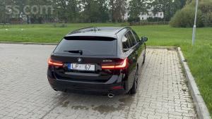 Black BMW 330 2021 in Dobele, with an engine capacity of 2.00 L and mileage of 209 thousand km for 20595 €, photo 12 on AUTOMOTO.COM.LV